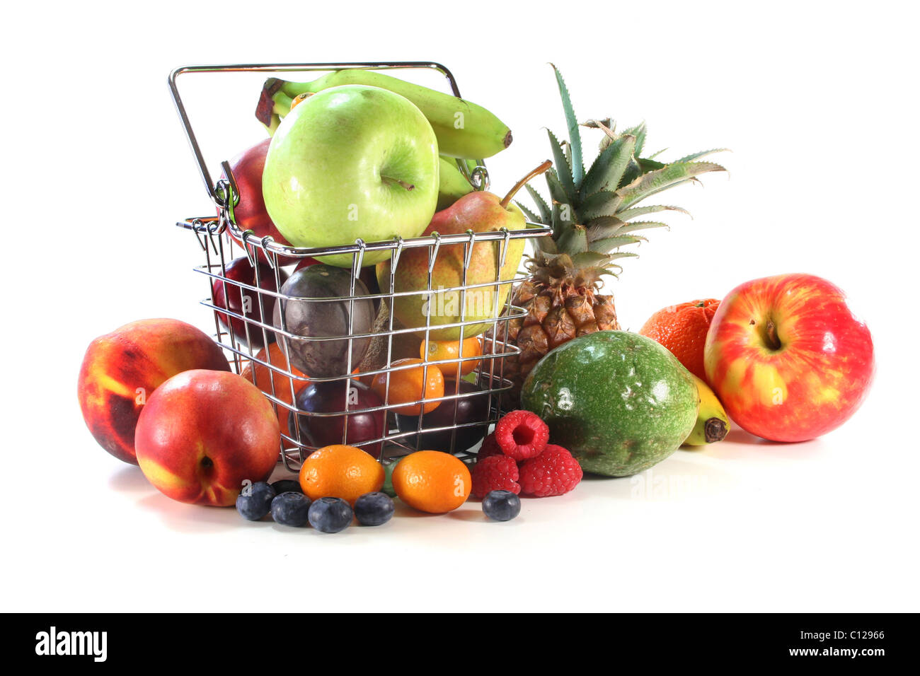 Mix of native and exotic fruit in a Shopping basket Stock Photo - Alamy