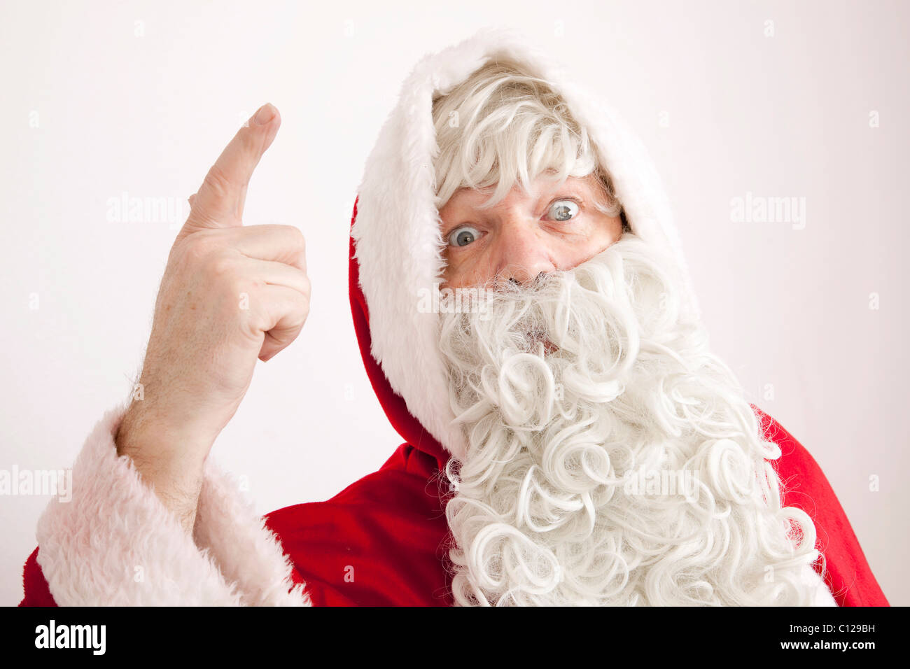 Santa Claus threatening, wagging his finger Stock Photo - Alamy