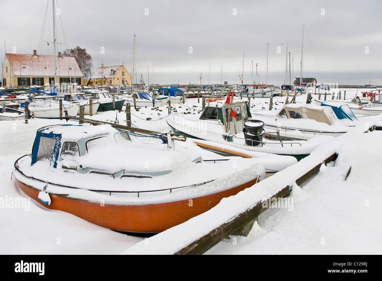 Dragor harbour frozen and covered in snow, Denmark, Europe Stock Photo ...