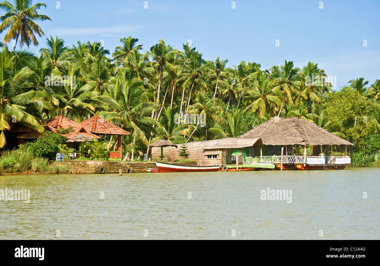 Kerala backwaters at trivandrum lake with a houseboat Stock Photo - Alamy