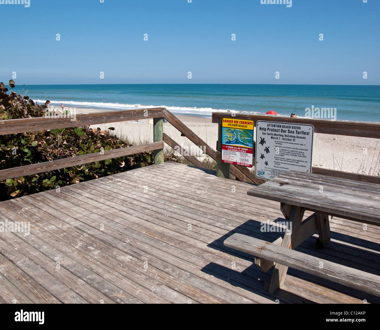 Rip current and sea turtle beach warning signs on Melbourne Beach in ...