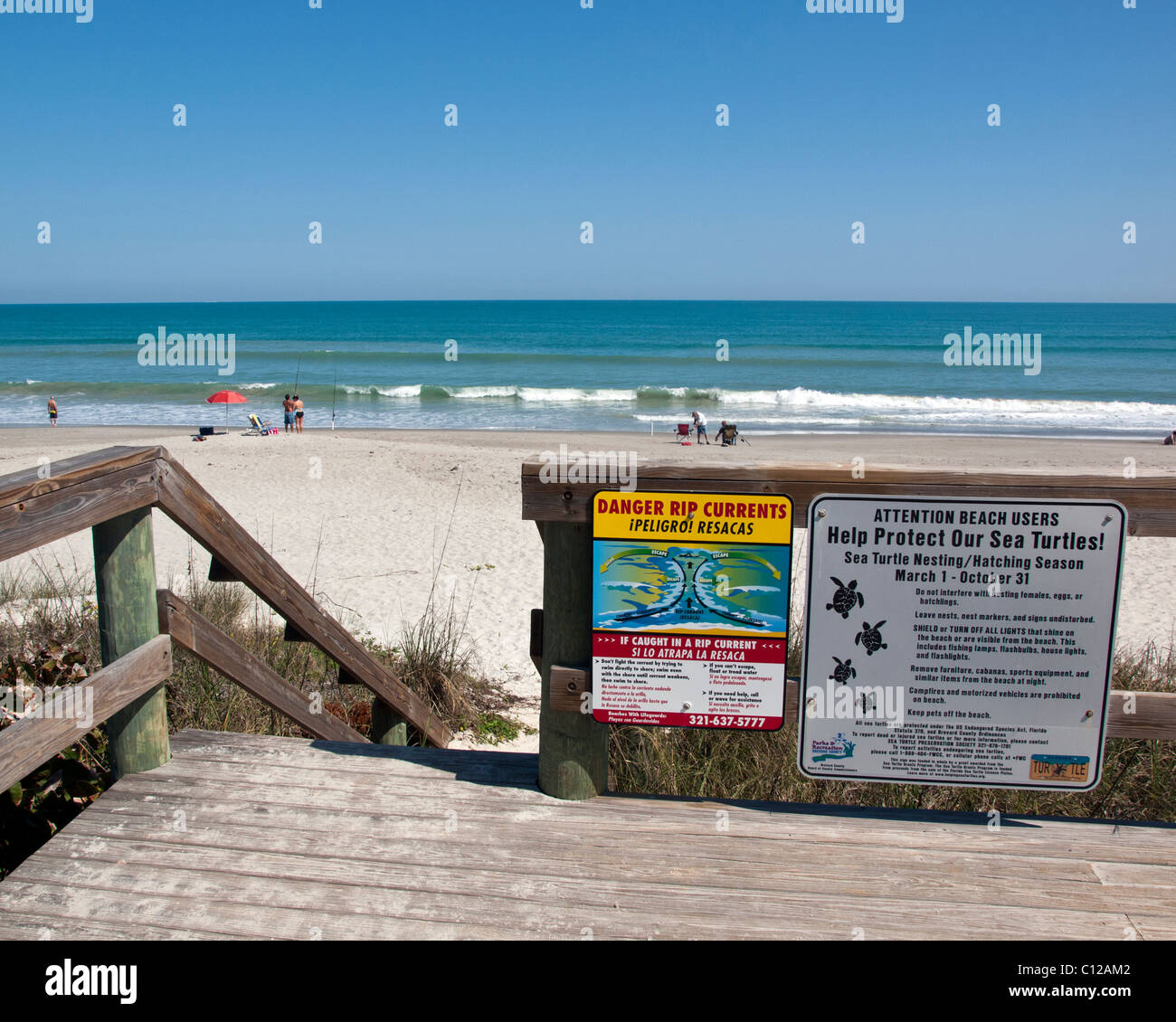 Rip current and sea turtle beach warning signs on Melbourne Beach in ...