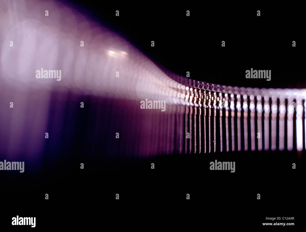 String of micro pins used to make connections on computer circuit ...