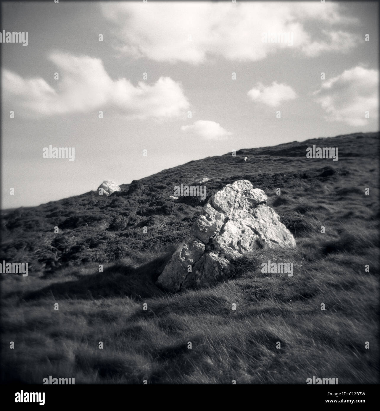 5 rocks in landscape. 5 clouds Stock Photo - Alamy