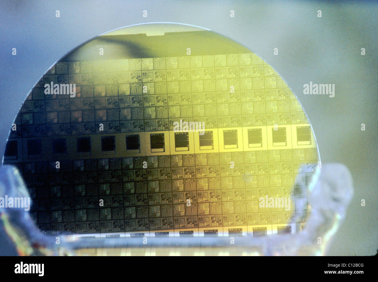 Close up of silicon wafer used to produce computer micro chips. Wafers ...