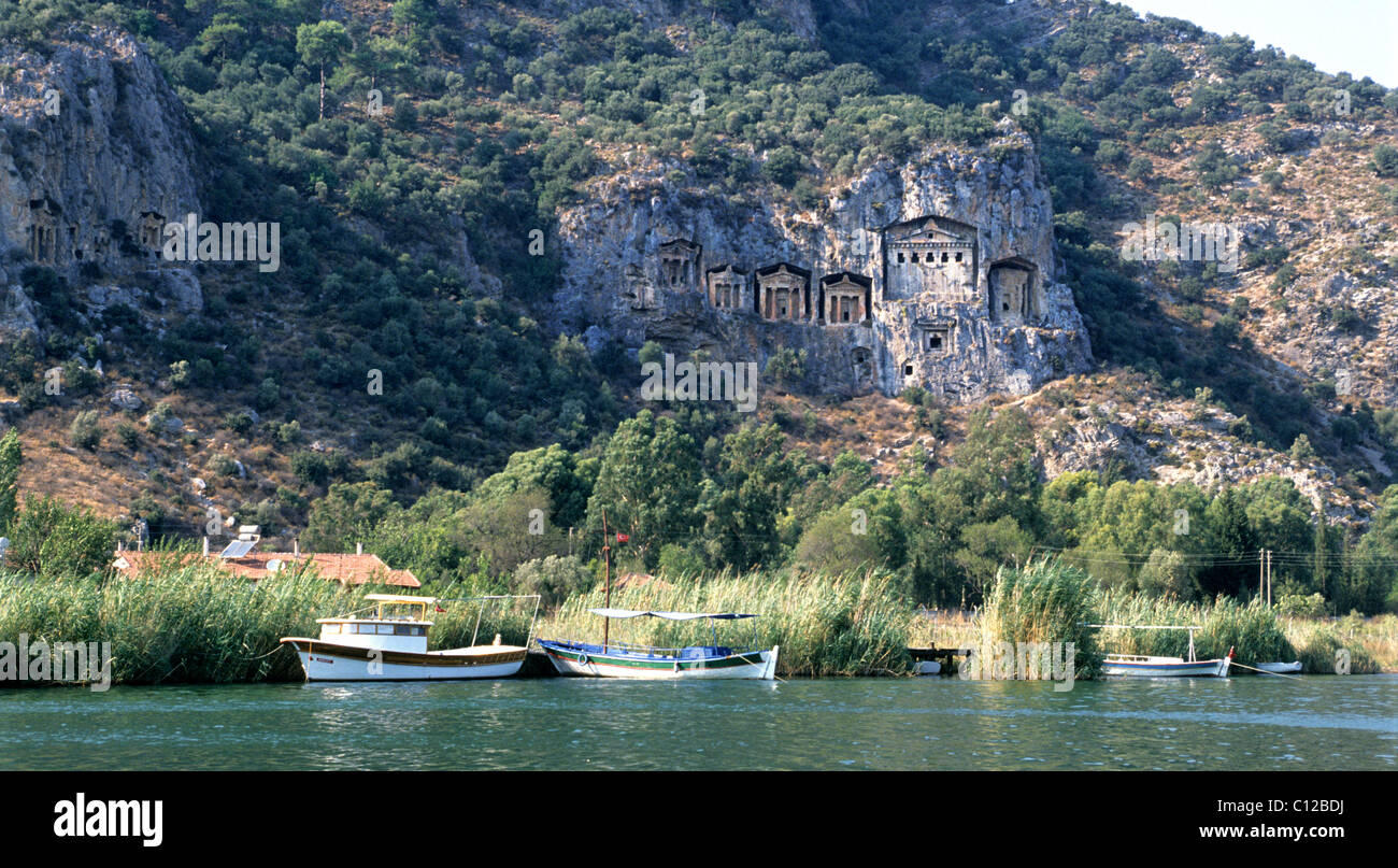 The Lycian rock tombs in the cliffs above the ruins of Kaunos, Kaunus ...