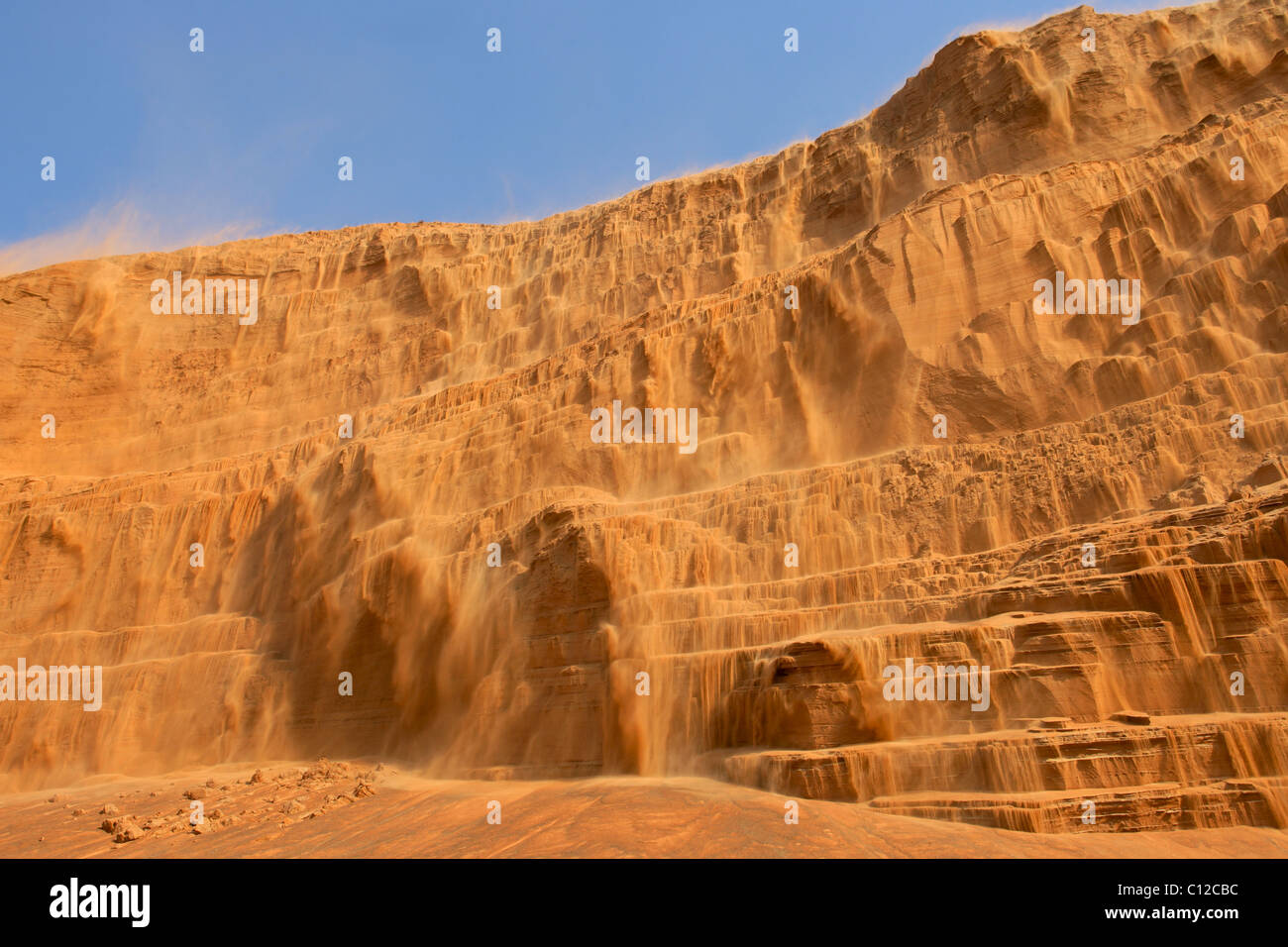 A 'waterfall' of sand in the desert near Dubai in the United Arab ...