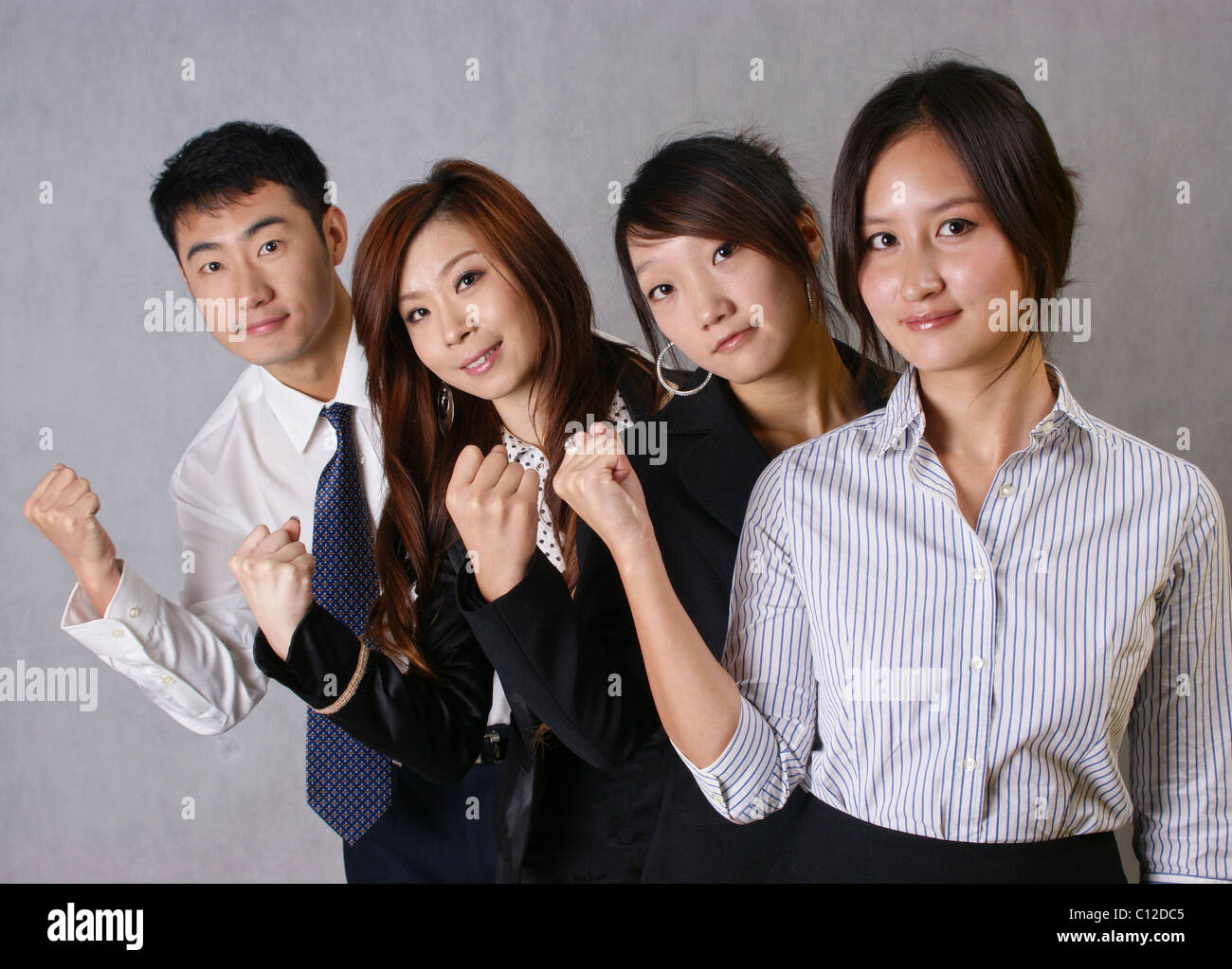 Chinese businessmen to encourage each Stock Photo - Alamy