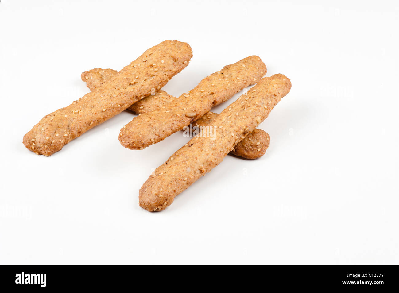 Several sesame bread sticks isolated on white background Stock Photo ...