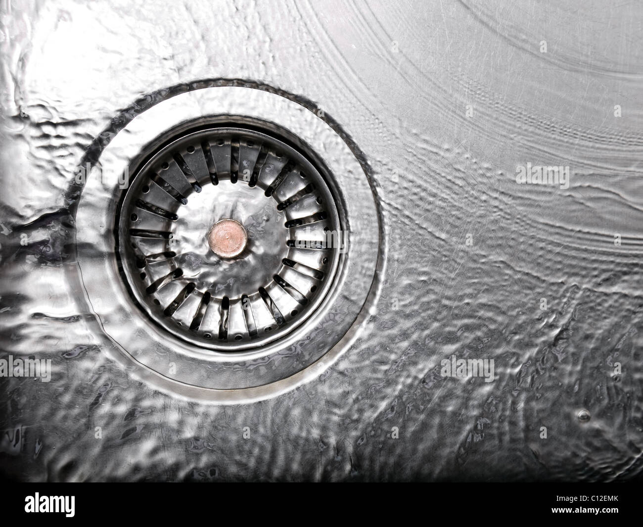View of the sink, drain and flowing water Stock Photo - Alamy