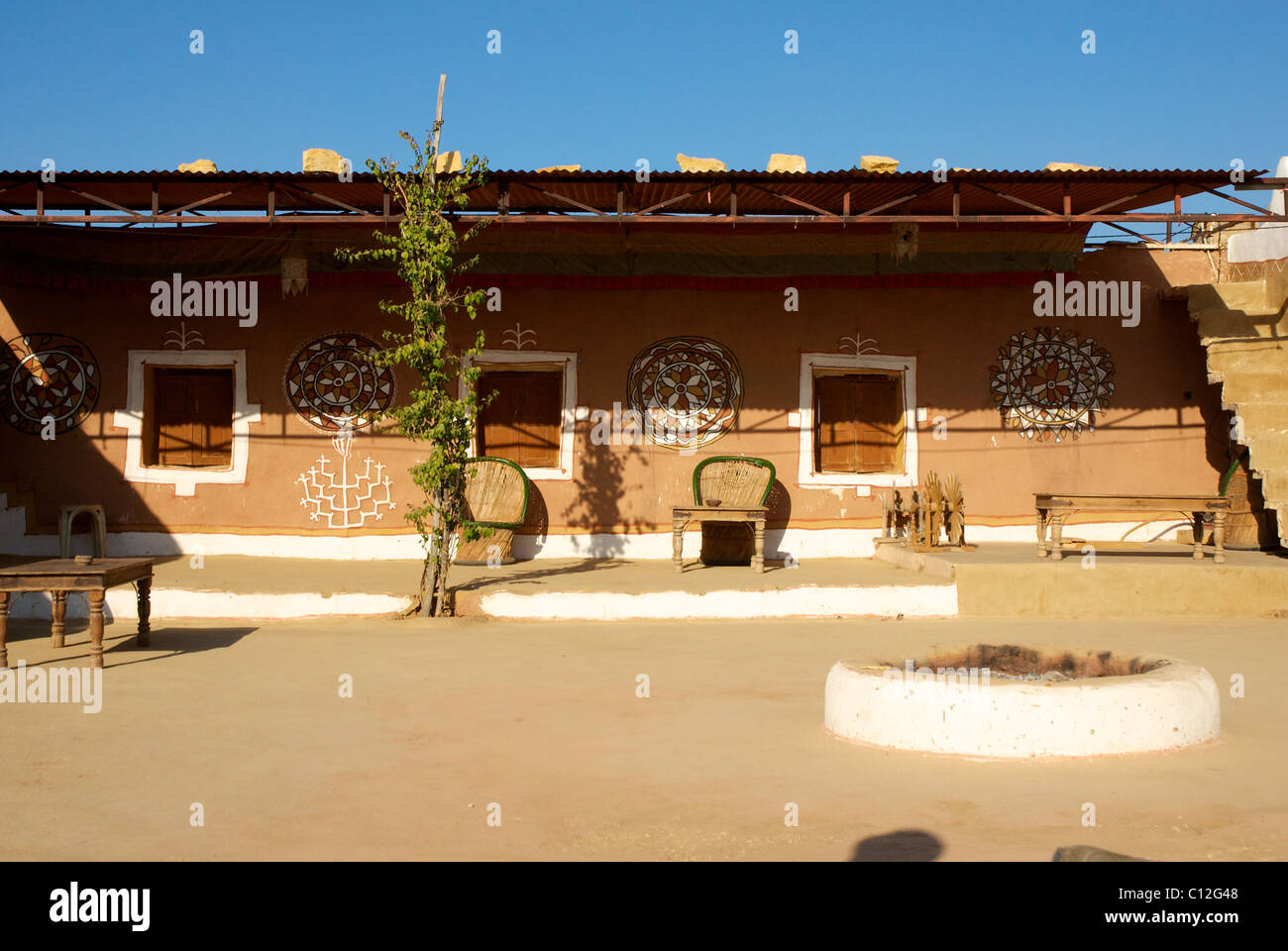 Shot of traditional desert building with artwork Stock Photo - Alamy