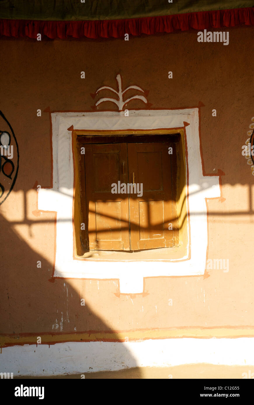 Shot of traditional desert building with artwork Stock Photo - Alamy