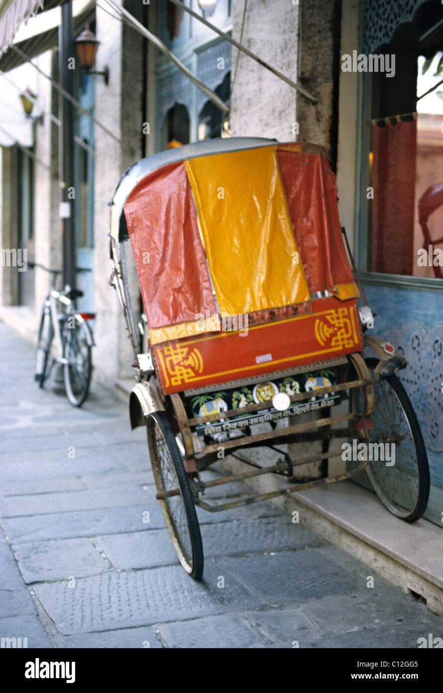 Rickshaw parked in front of an Indian restaurant, Pisa, Italy Stock ...