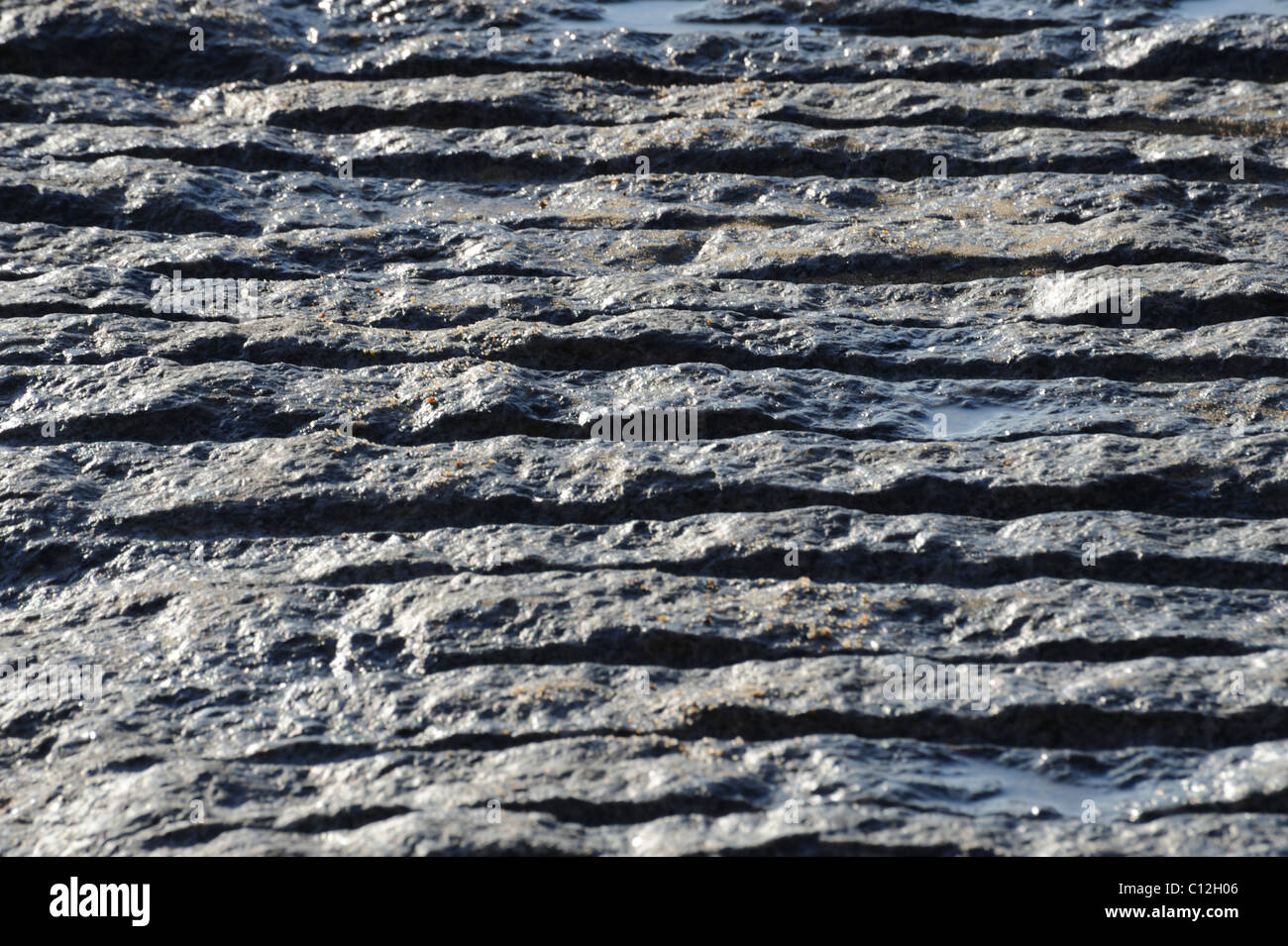 Dynamite marks on a boulder, Southwold, Suffolk, UK Stock Photo - Alamy