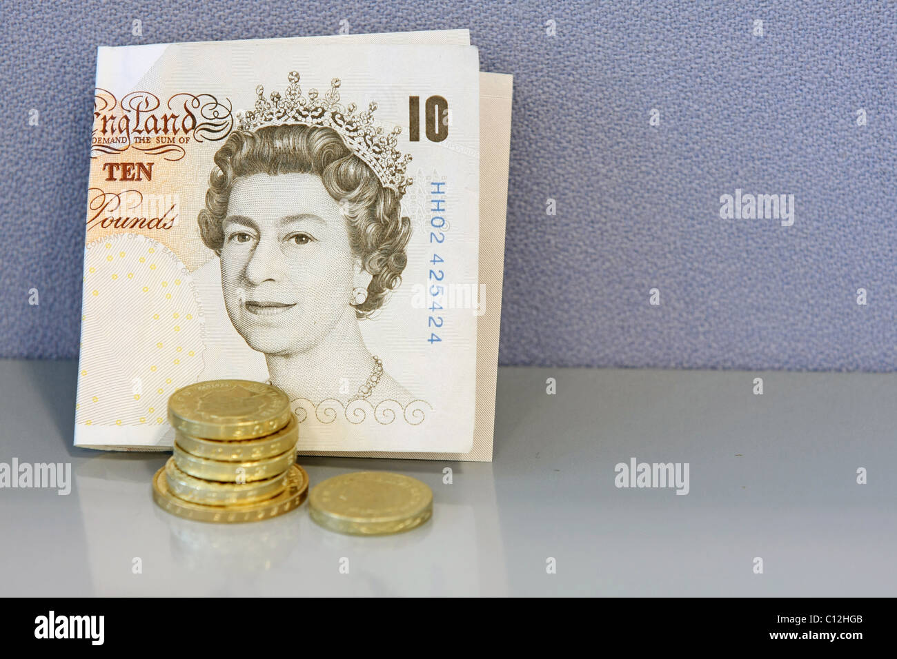 Coins folded hi-res stock photography and images - Alamy