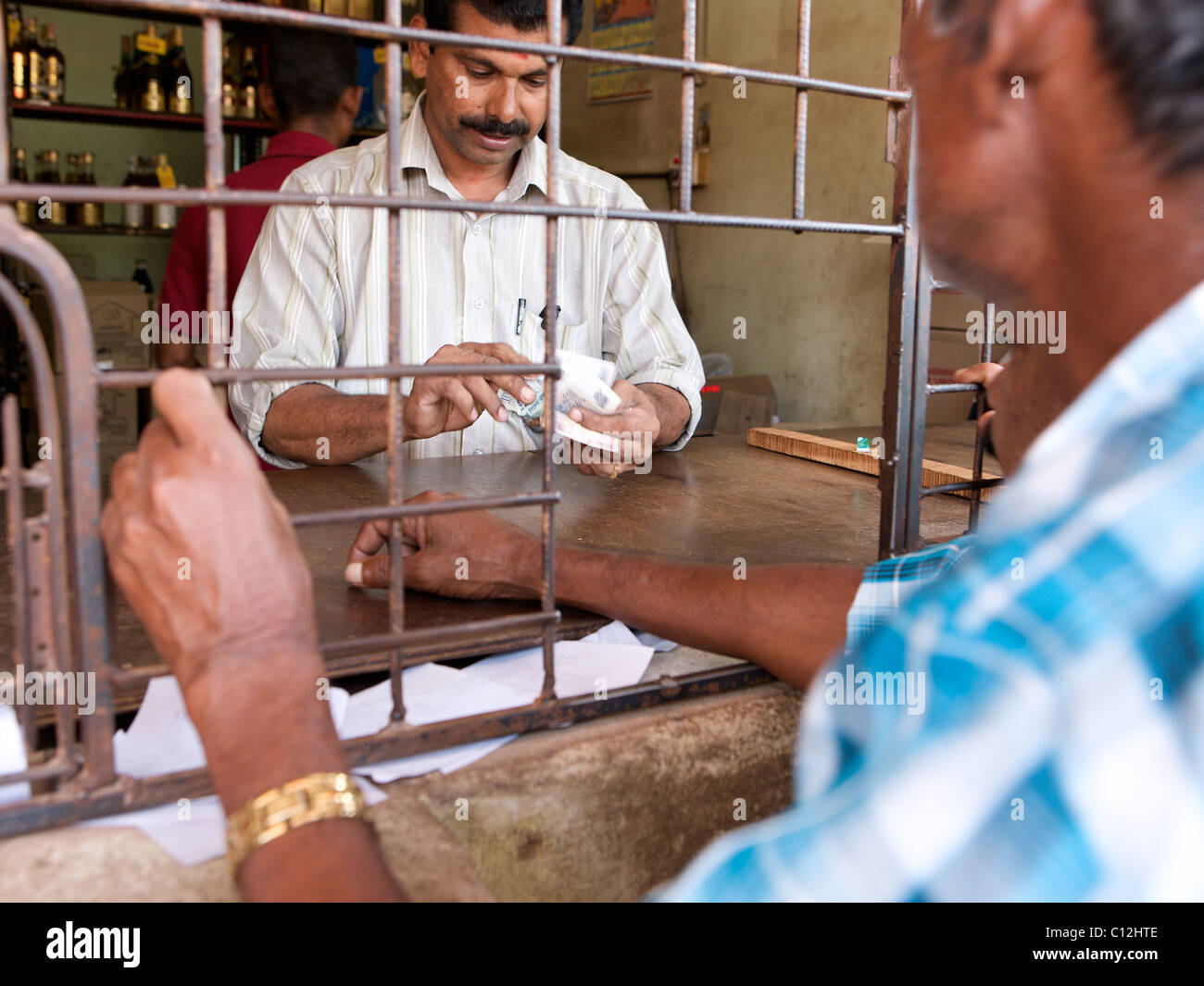 Counting customers hi-res stock photography and images - Alamy