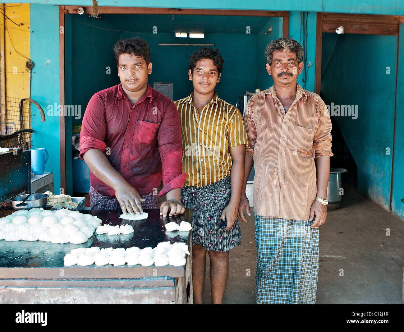Road-side chapatti makers, Kochi, Kerala, India Stock Photo - Alamy