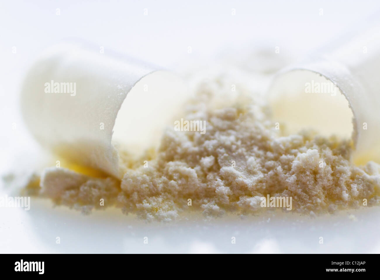 Close up of broken drug capsule Stock Photo - Alamy