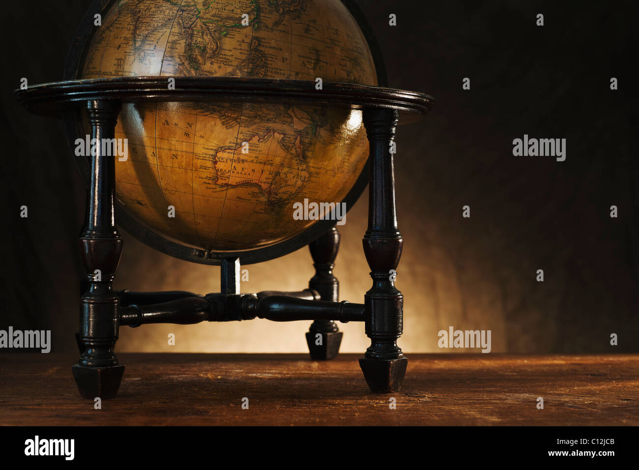 Close up of antique globe on table Stock Photo - Alamy