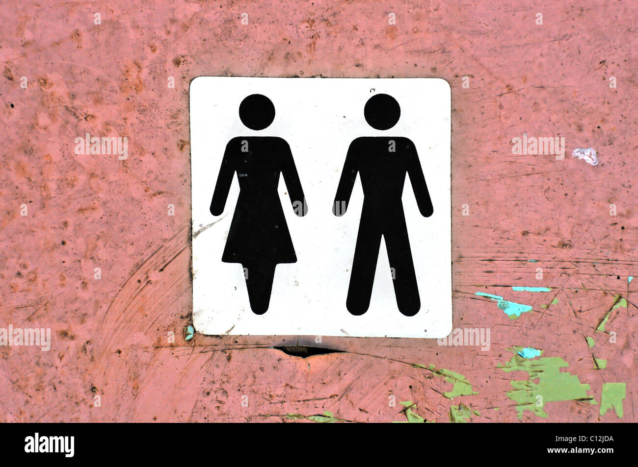 Male female symbol label on grungy wood background texture Stock Photo ...