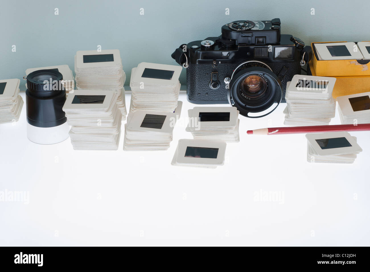 Close up of slides and camera on light box Stock Photo - Alamy