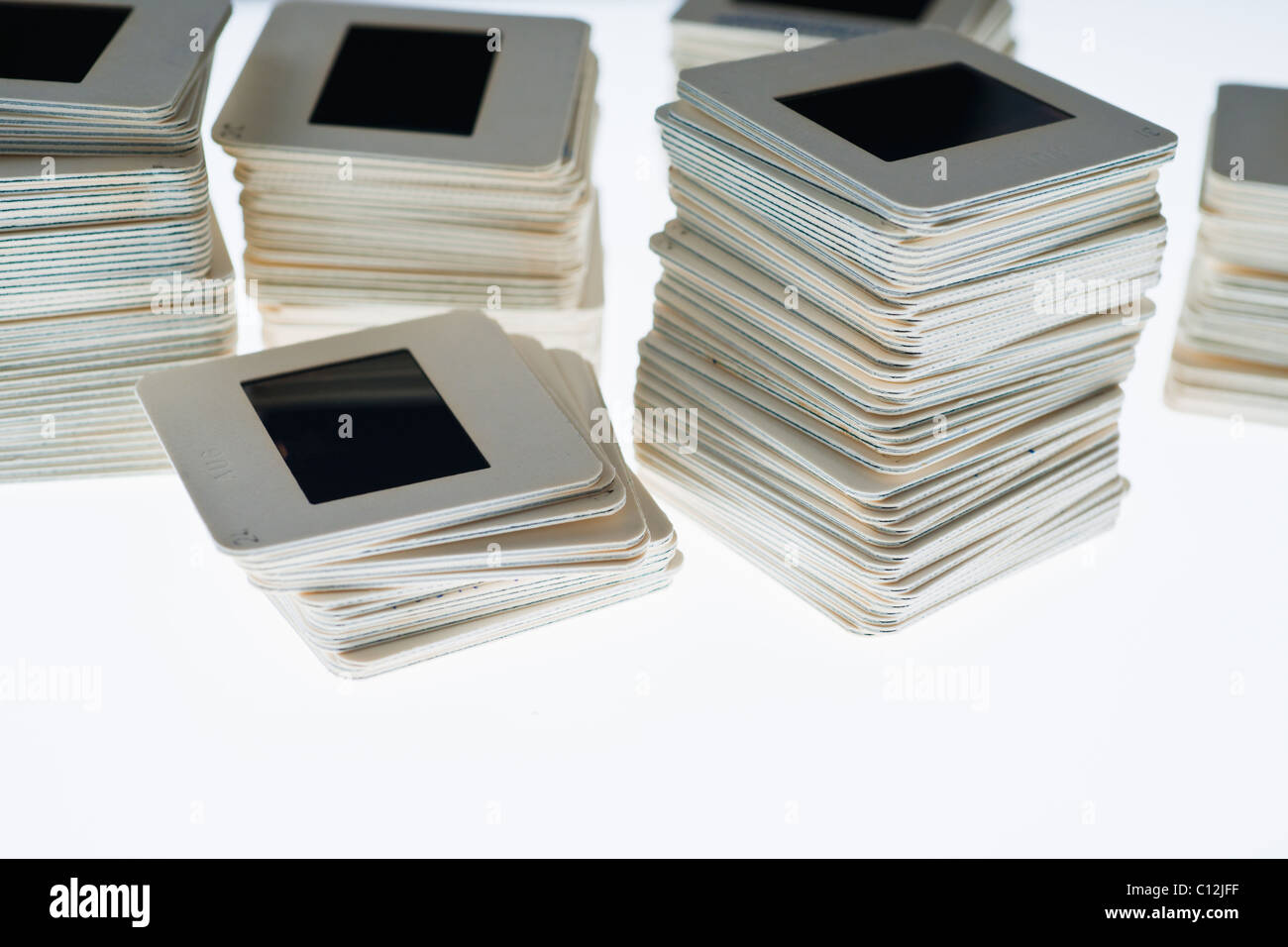 Close up of slides in piles on light box Stock Photo - Alamy