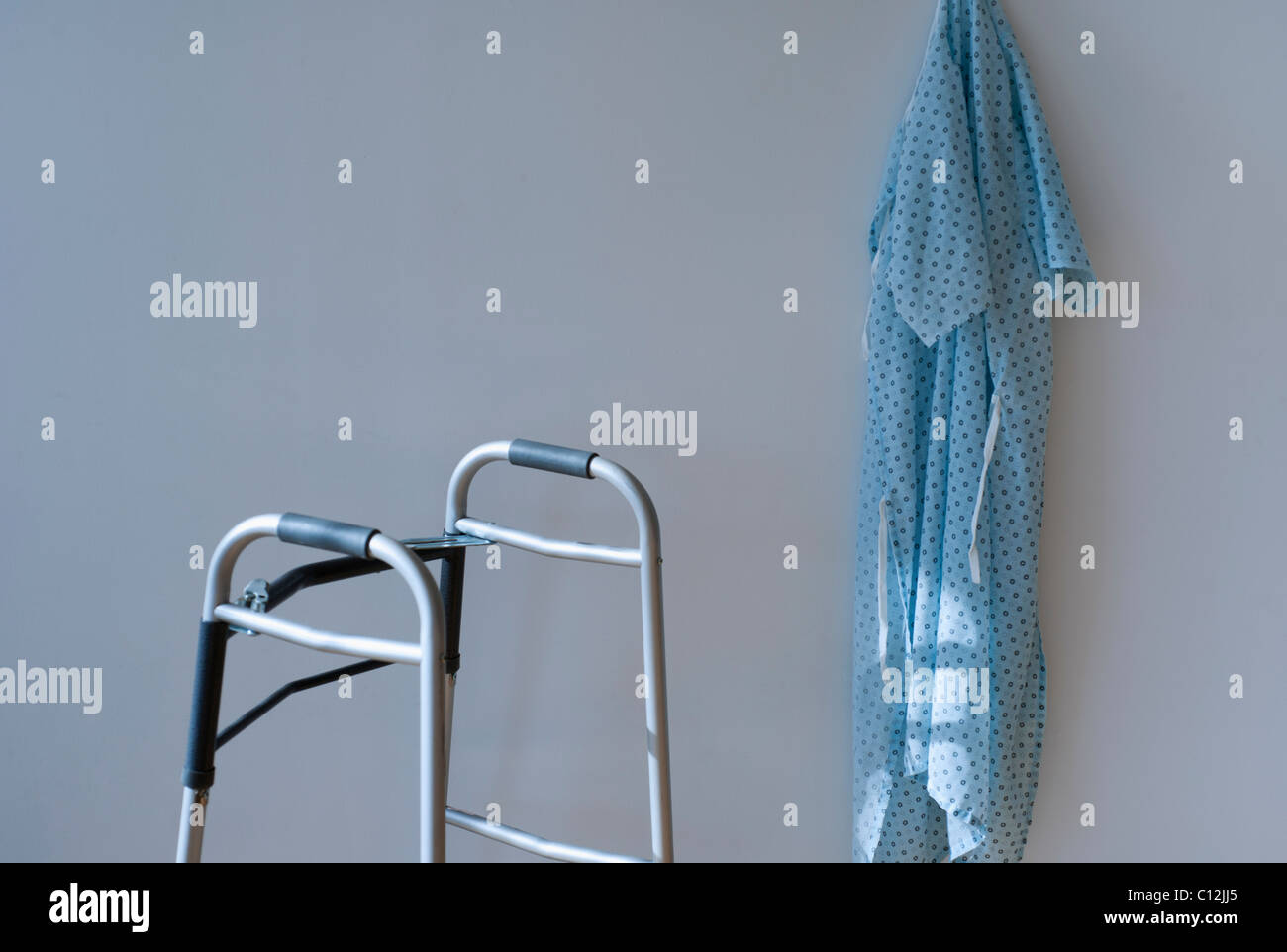 Walking frame and patients gown in hospital Stock Photo - Alamy