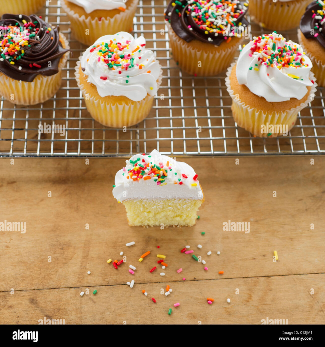 Homemade cupcakes, one with missing bite Stock Photo - Alamy