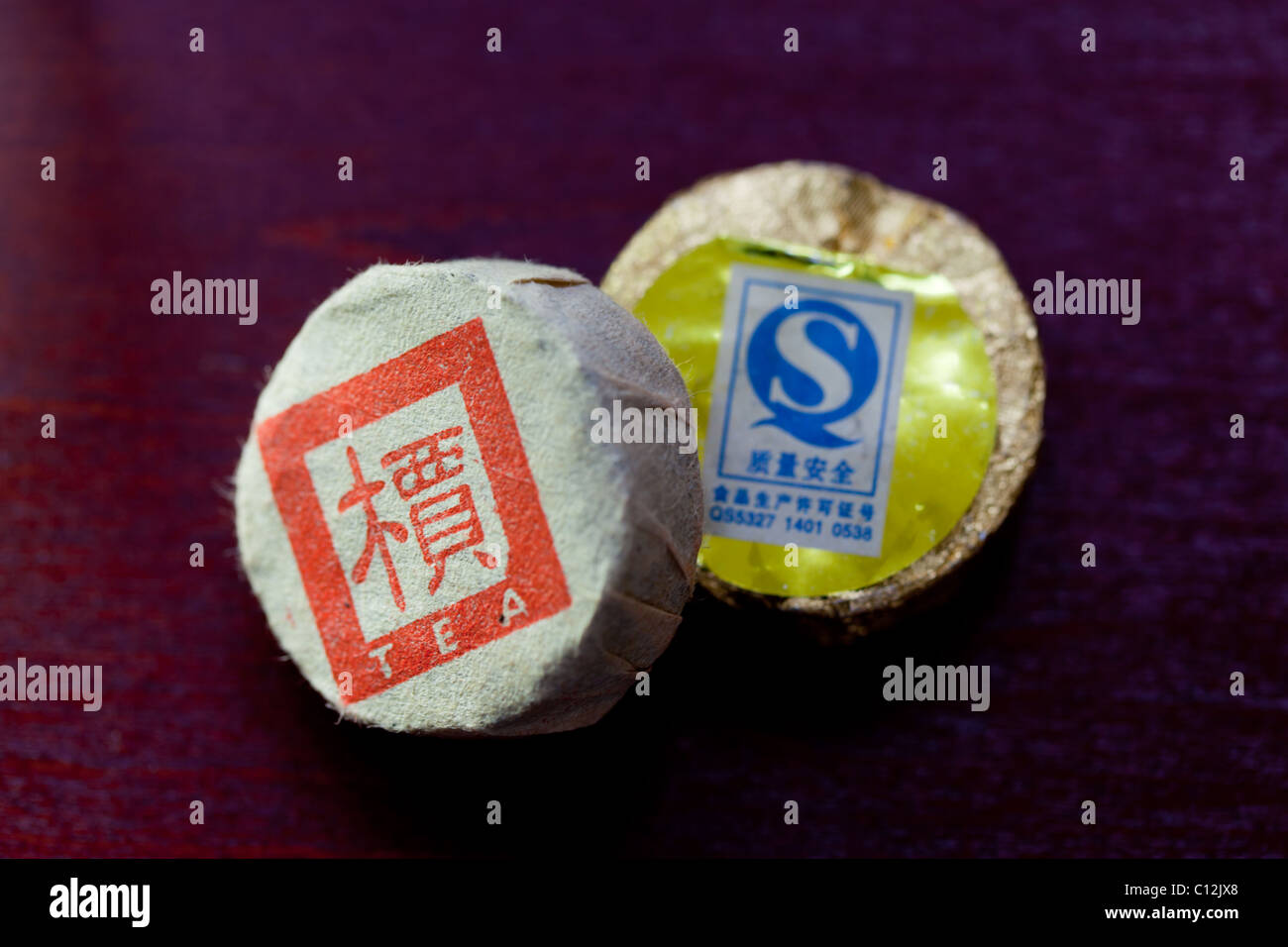 Wrapped tablets of Chinese black tea Stock Photo - Alamy