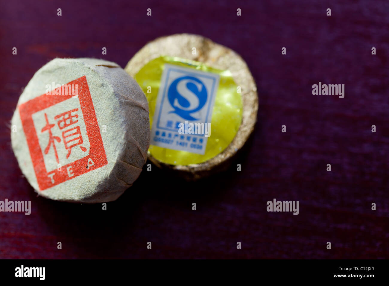 Wrapped tablets of Chinese black tea Stock Photo - Alamy