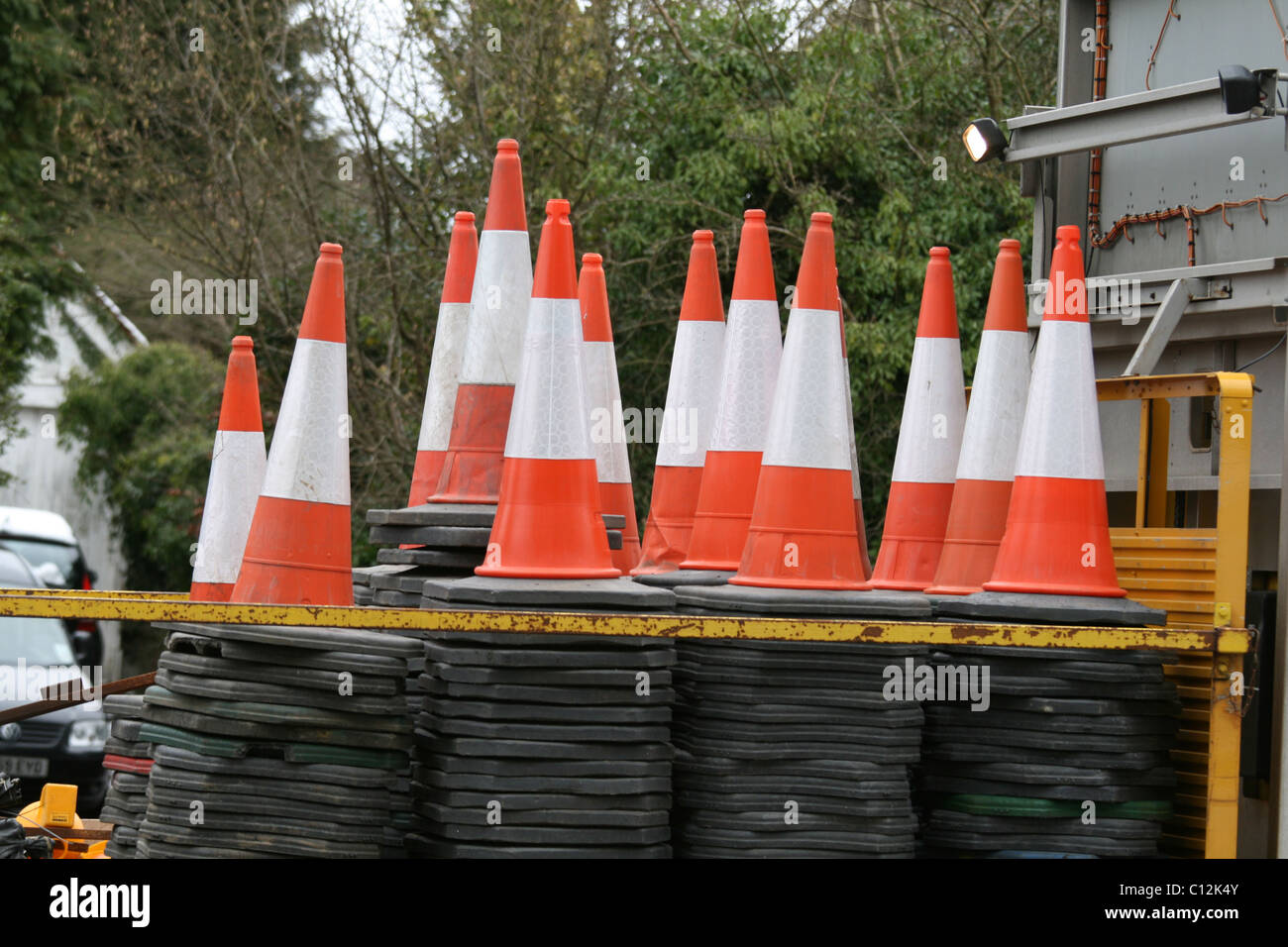 Stack of road cones awaiting use Stock Photo - Alamy