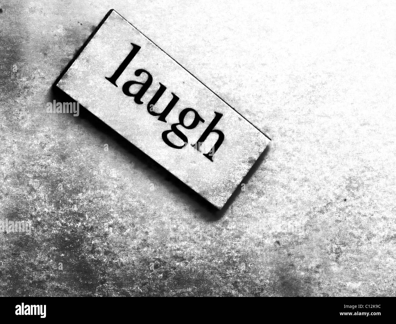 Dirty laugh word sign Stock Photo - Alamy