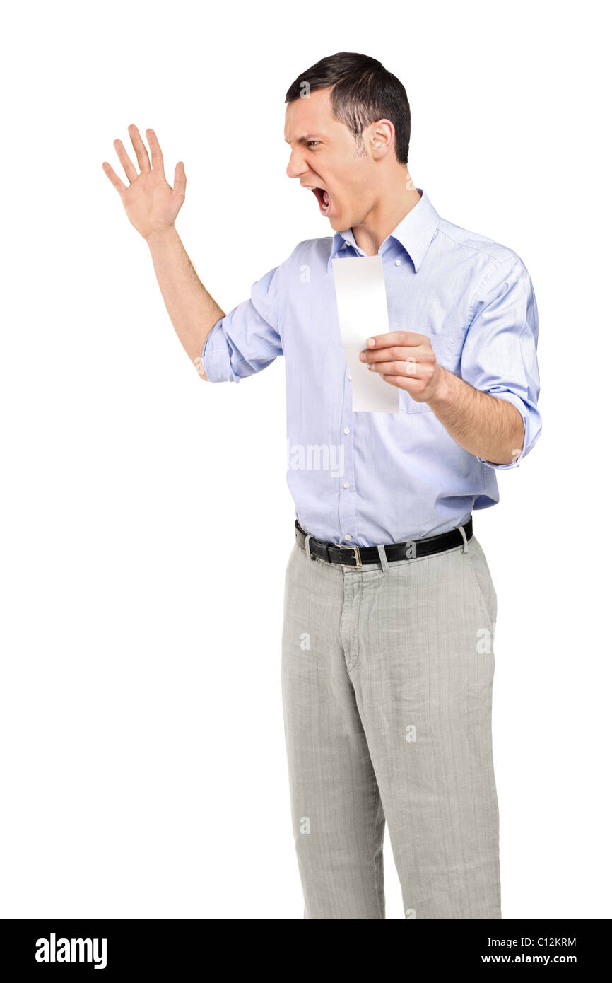 Angry man yelling after looking at store receipt Stock Photo - Alamy