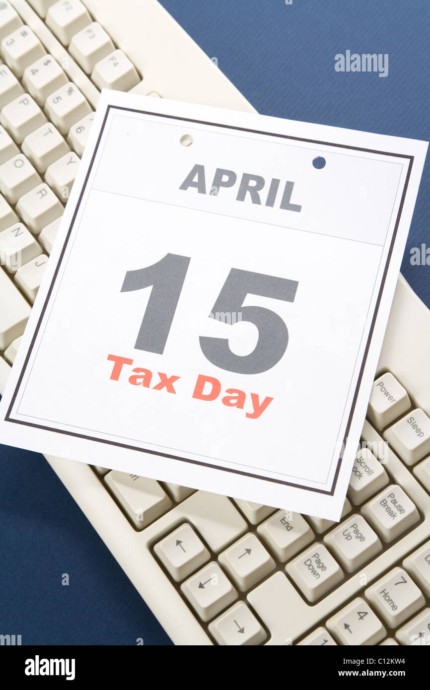 Tax Day, calendar date April 15 and keyboard for background Stock Photo ...