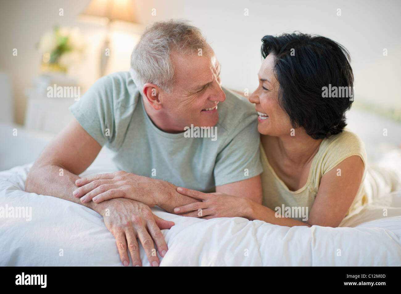 Couple mature bed 45 hi-res stock photography and images - Alamy