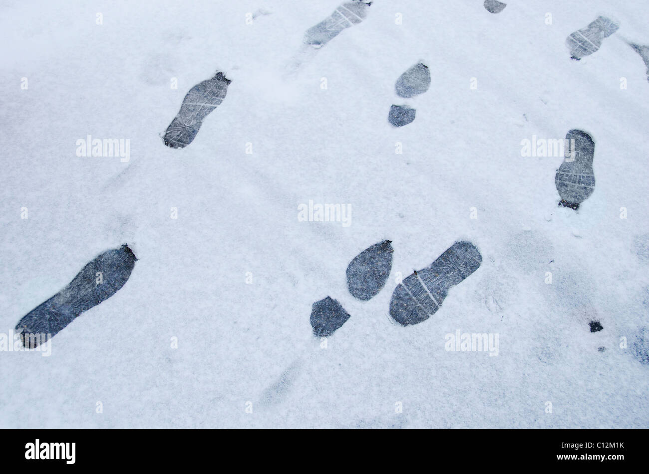 USA, New York City, Footprints in snow Stock Photo - Alamy