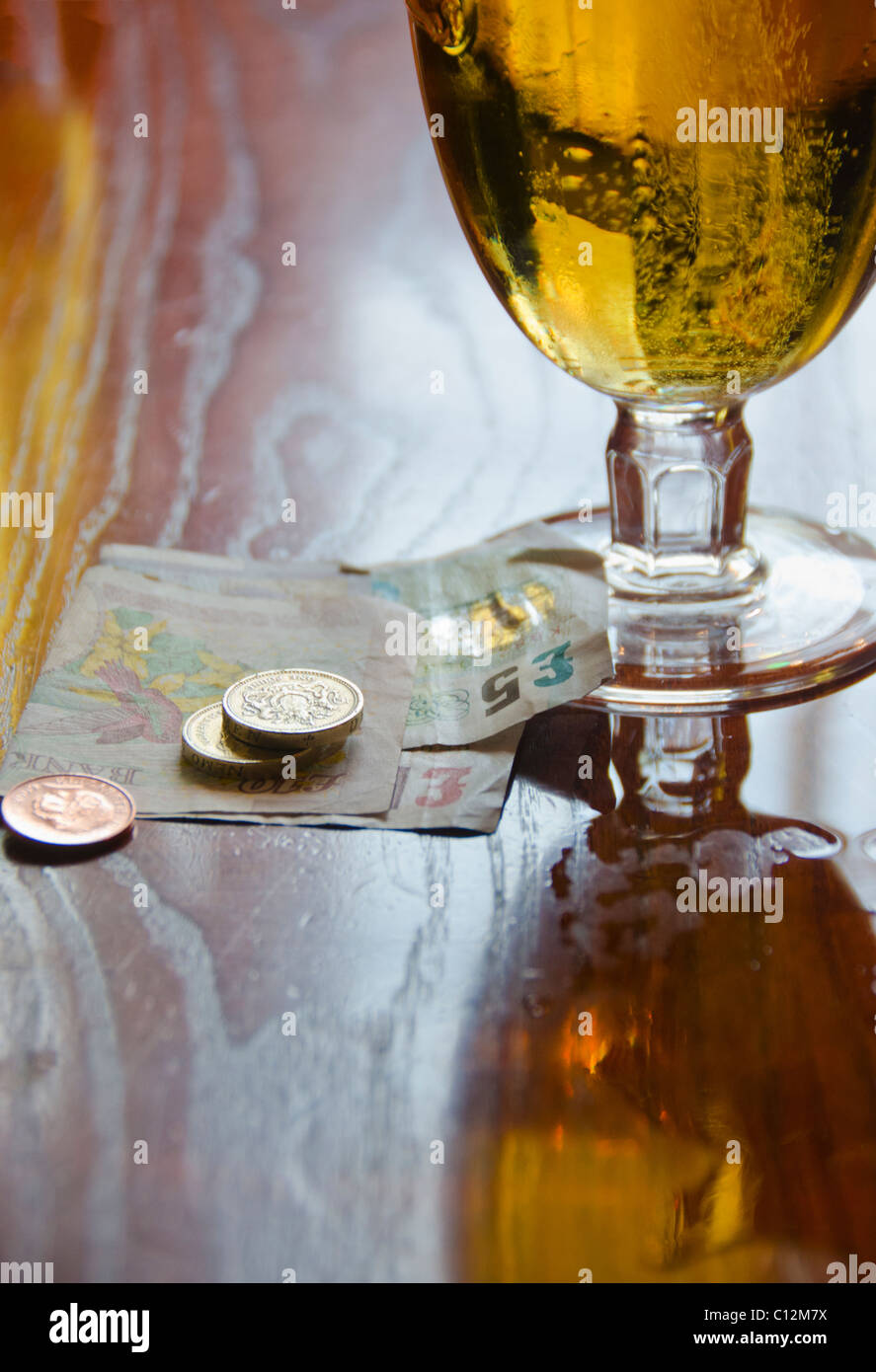 United Kingdom, Bristol, british currency and beer on table Stock Photo ...