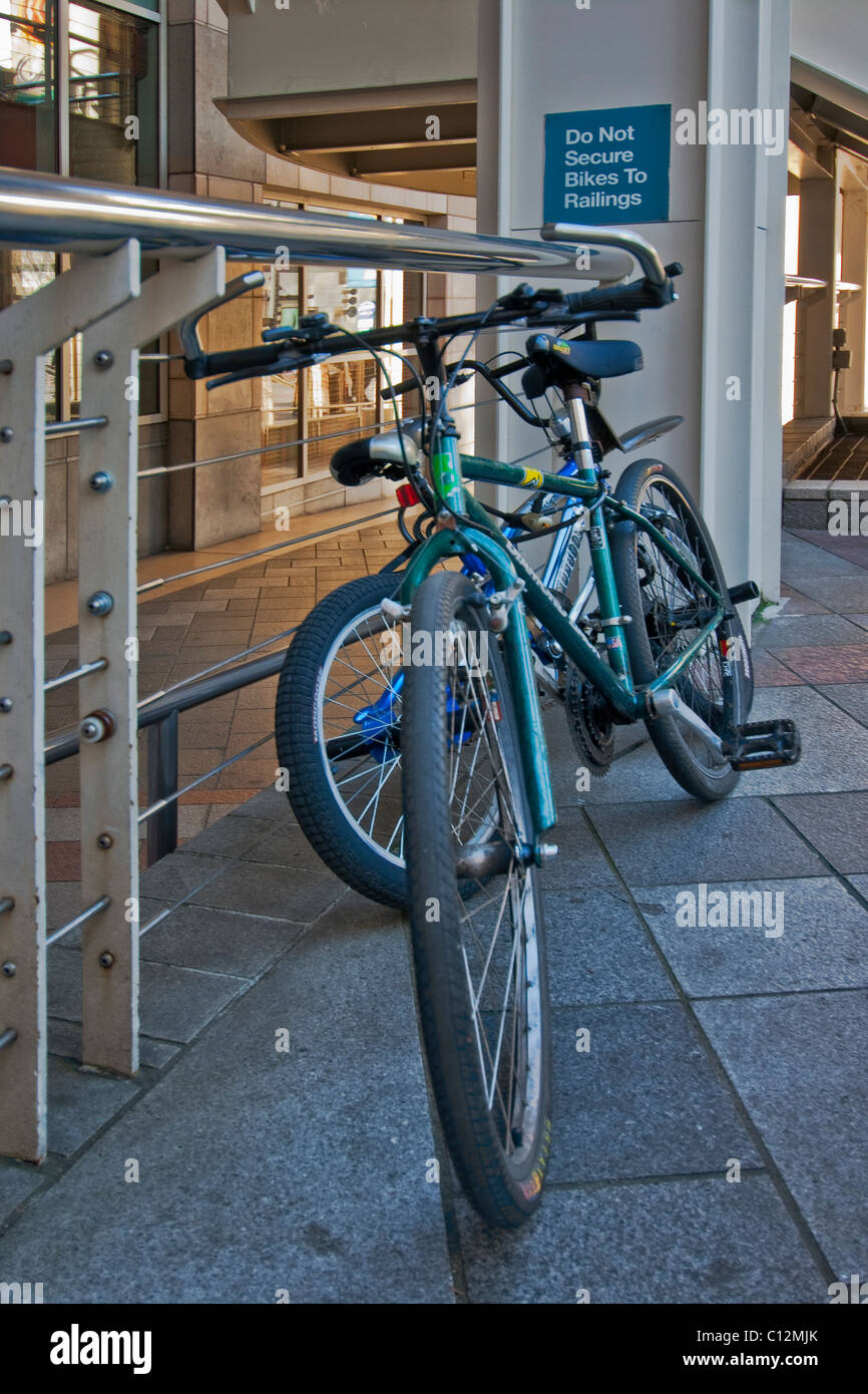 Do Not Lock Bikes To Railing Sign High Resolution Stock Photography and ...