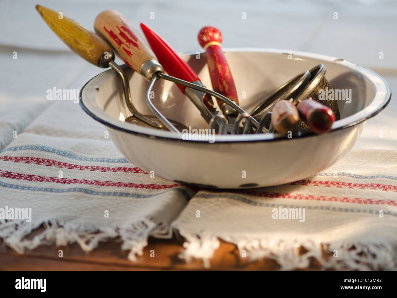 Antique cooking utensils in bowl Stock Photo - Alamy