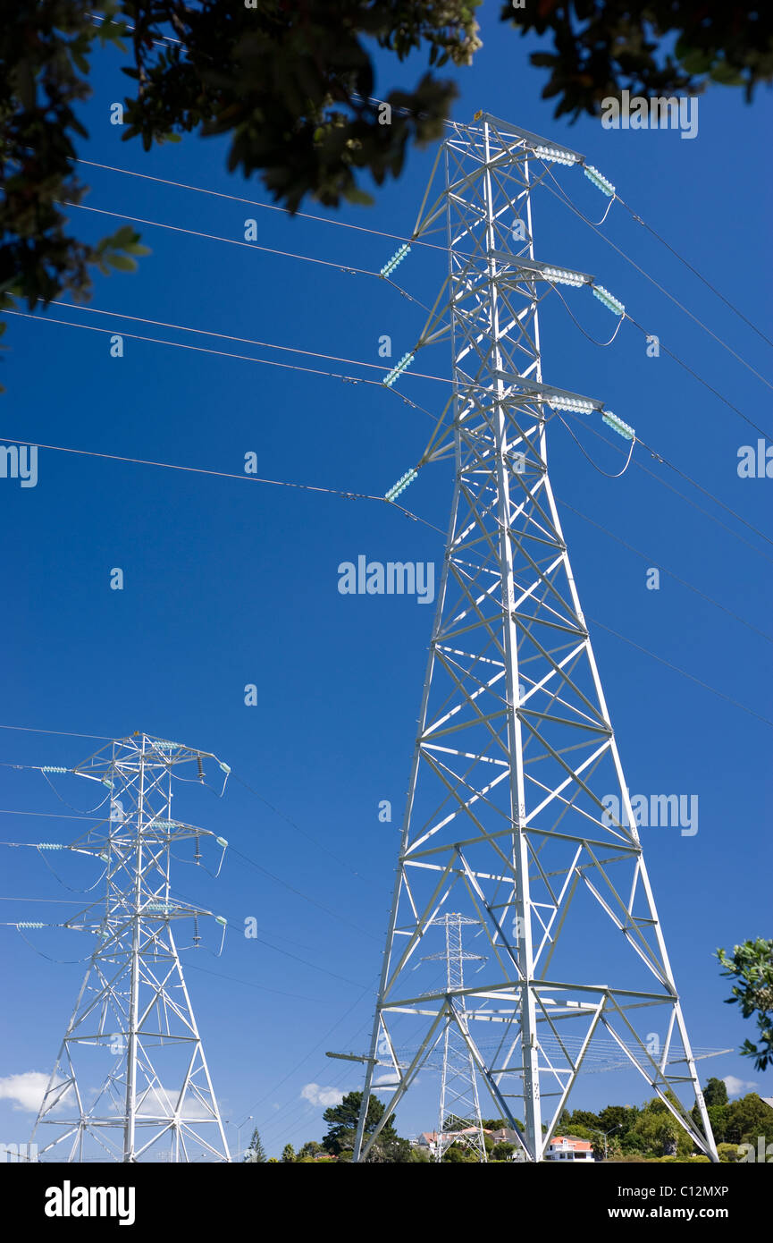 11000 volt pylons against rich deep blue clear sky can depict visual ...