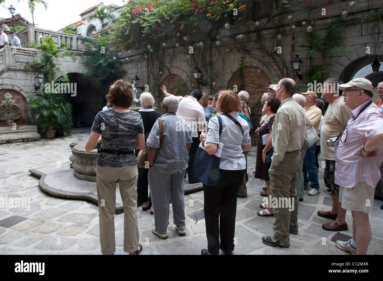 Tour Guide and Tourists in Intramuros Manila Stock Photo - Alamy
