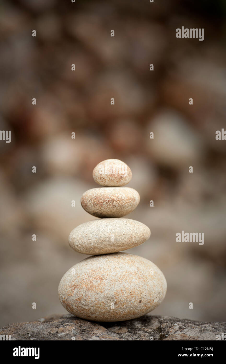 pile of peacefully balanced stones against rocky background Stock Photo ...
