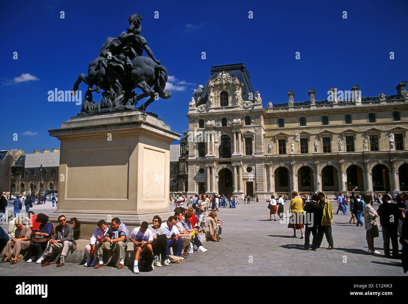 people, tourists in the Cour Napoleon, courtyard, Louvre Museum, art ...