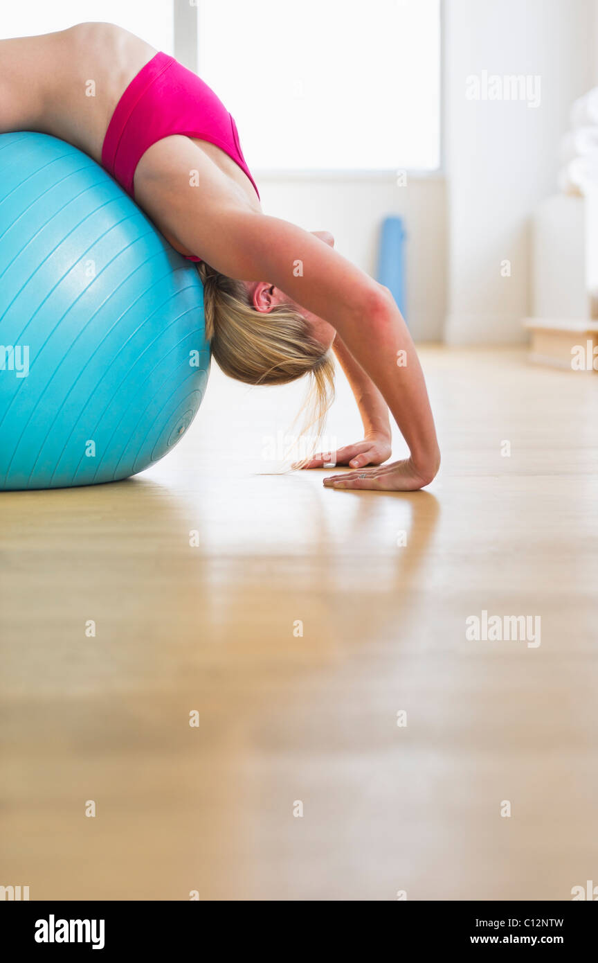 Gym woman bending backwards over hi-res stock photography and images ...
