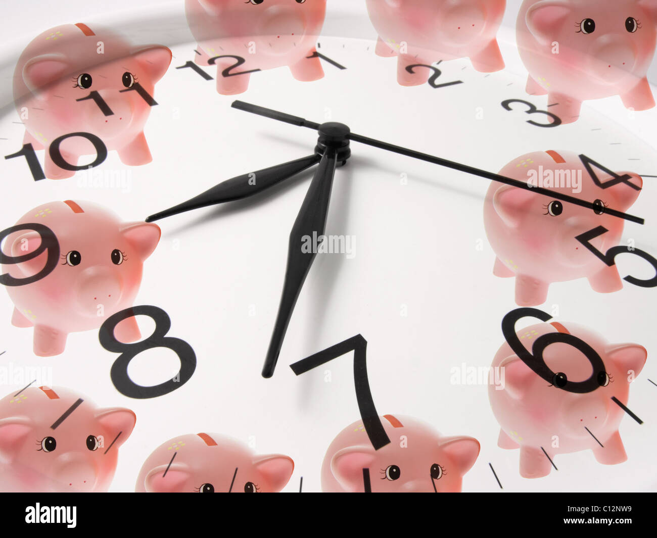 Clock and Piggy Banks Stock Photo - Alamy