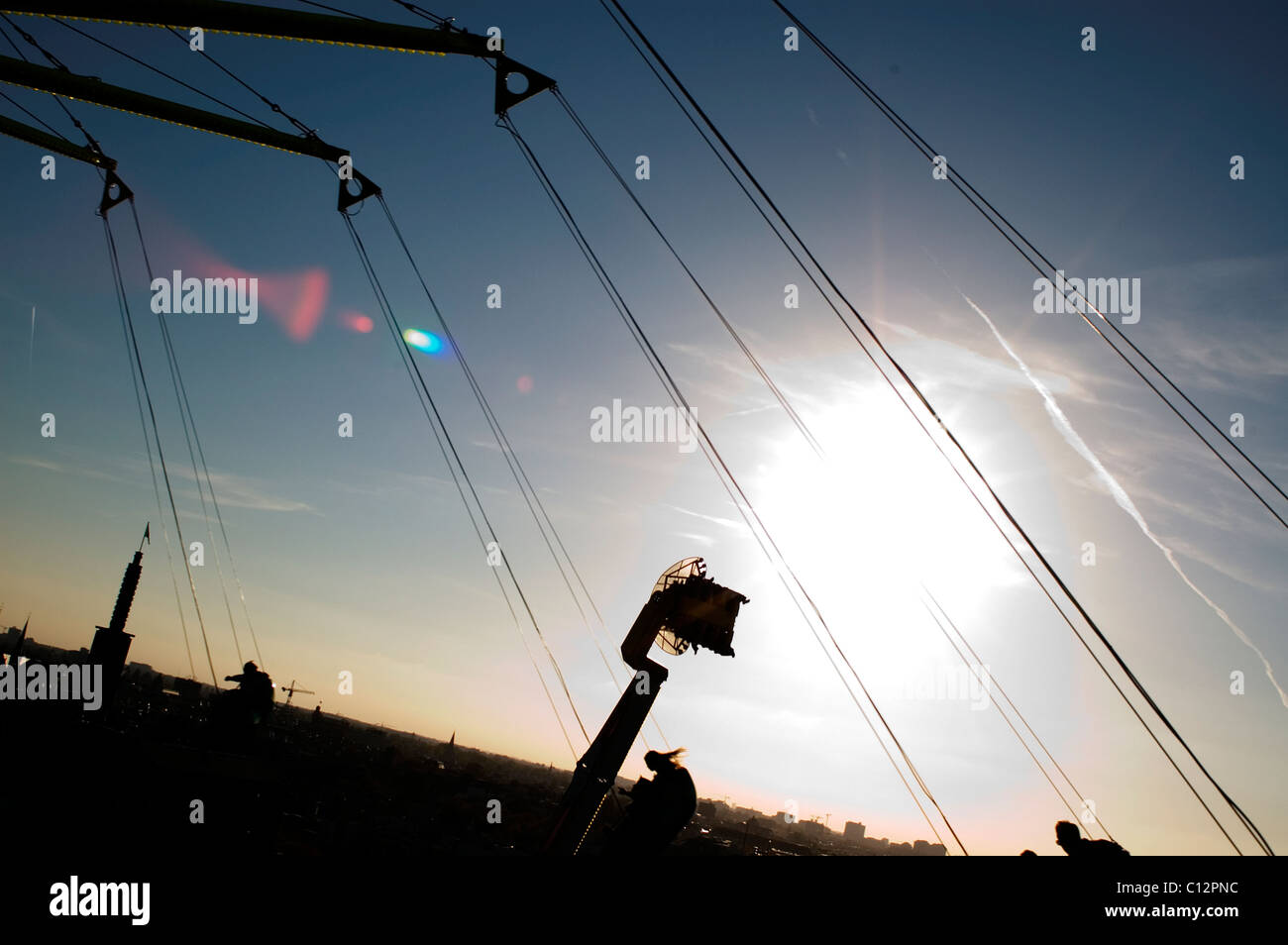 Suspension wires and bright sunlight Stock Photo - Alamy