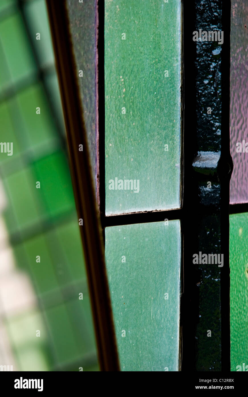 Green stained glass windows Stock Photo - Alamy