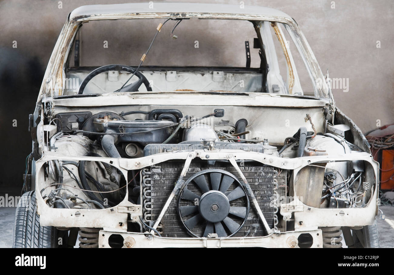 Car frame in a garage Stock Photo - Alamy