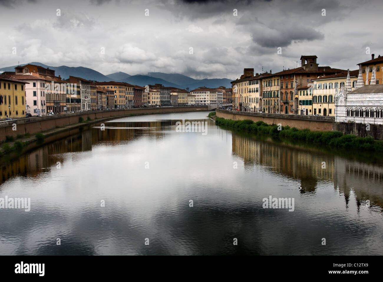 River Arno flows through Pisa, Italy, Tuscany Stock Photo - Alamy