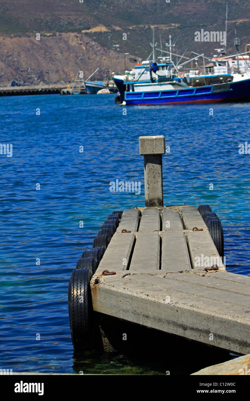 Jetty in Hout Bay Harbour with concrete mooring post Stock Photo - Alamy